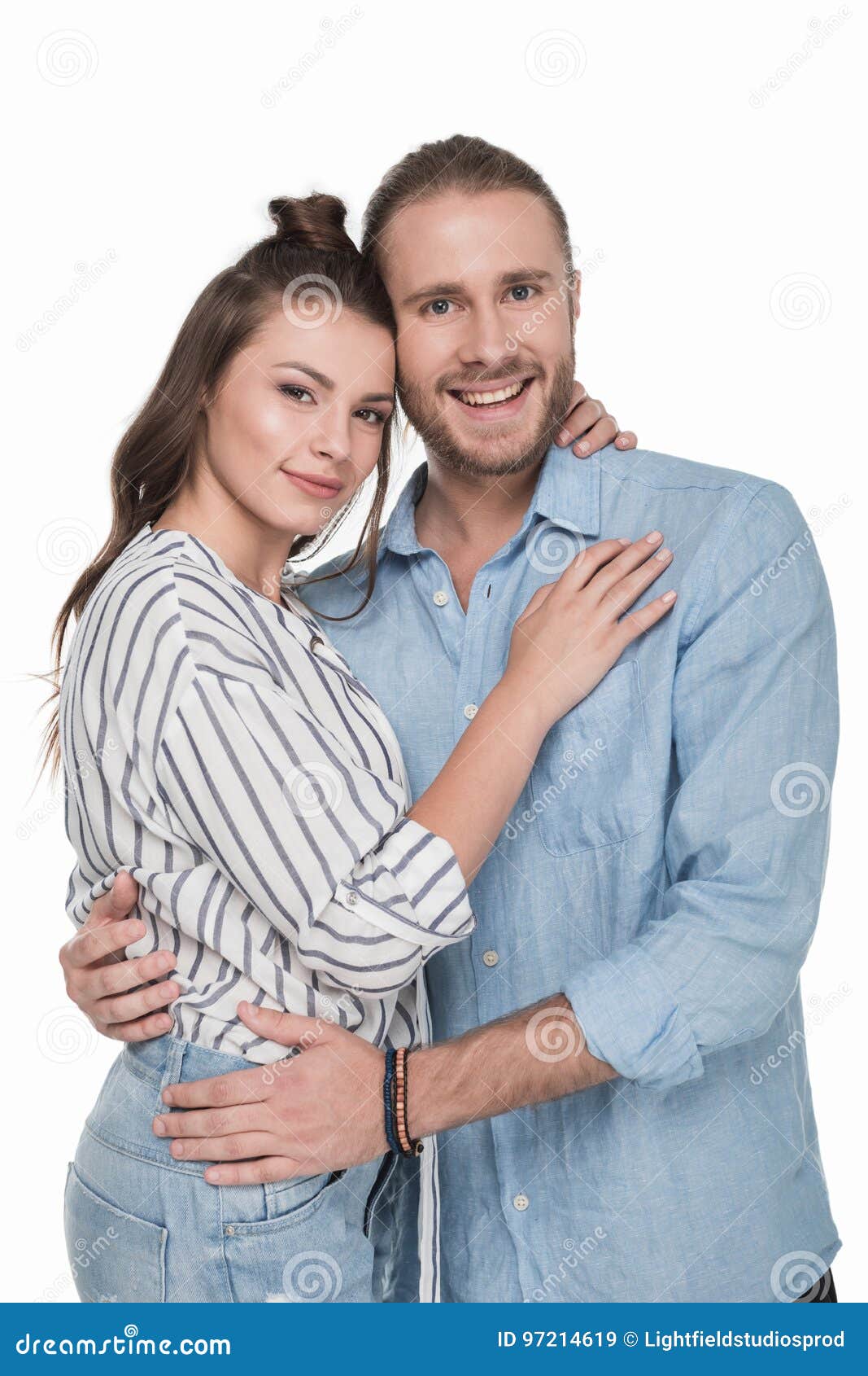 Happy Young Couple Standing Embracing and Smiling at Camera Stock Image ...