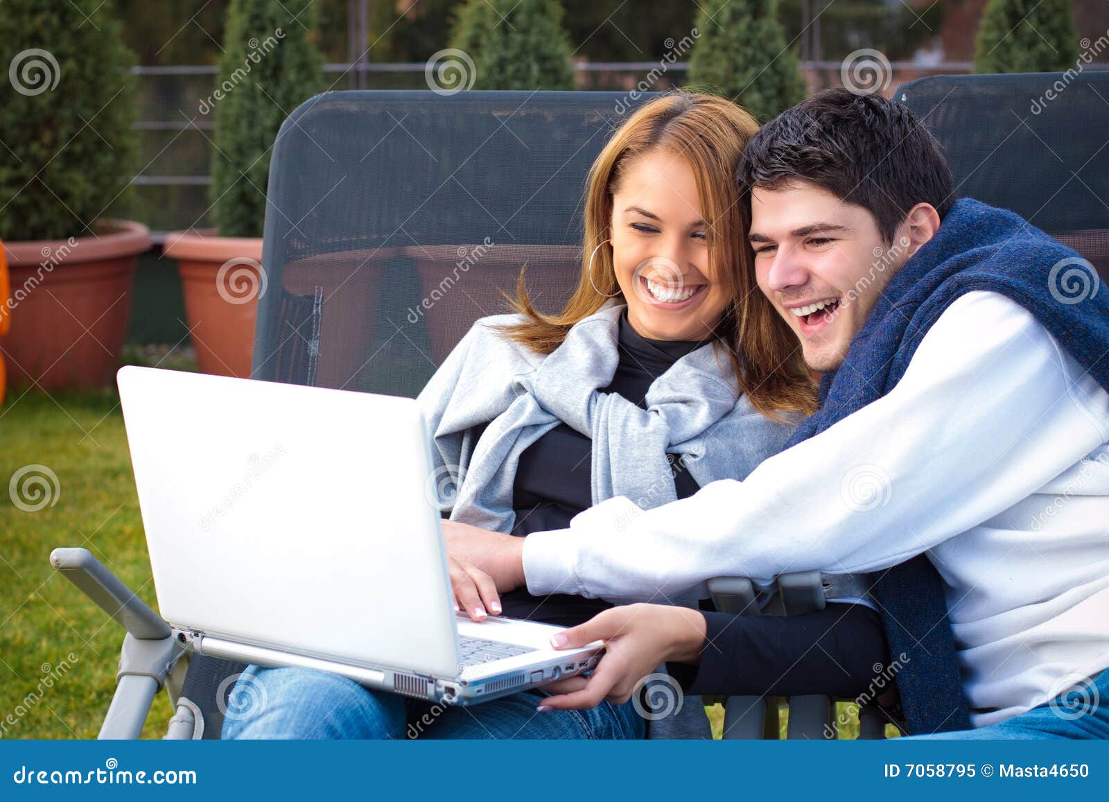 Happy Young Couple Surfing the Internet Stock Image - Image of living ...