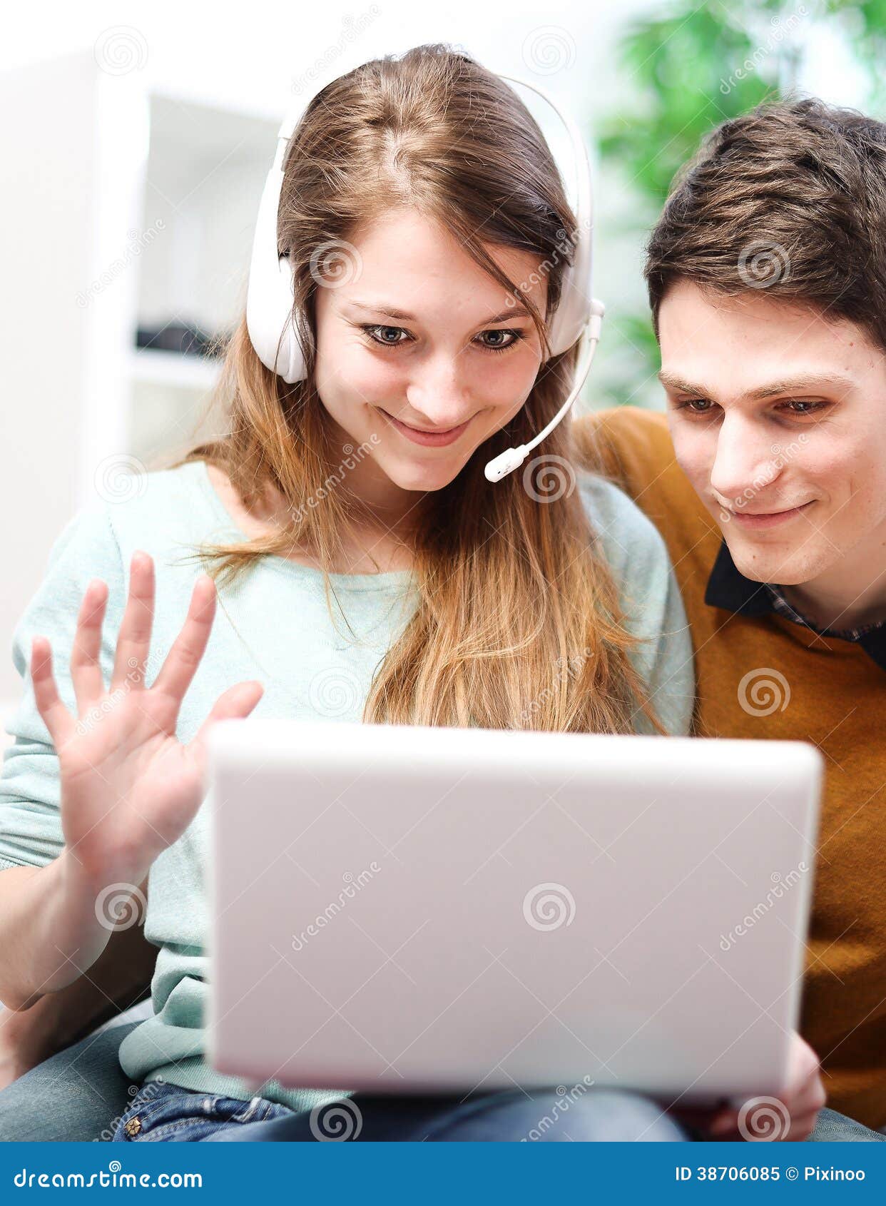 Happy Young Couple Talking through the Computer with Video Chat Stock ...