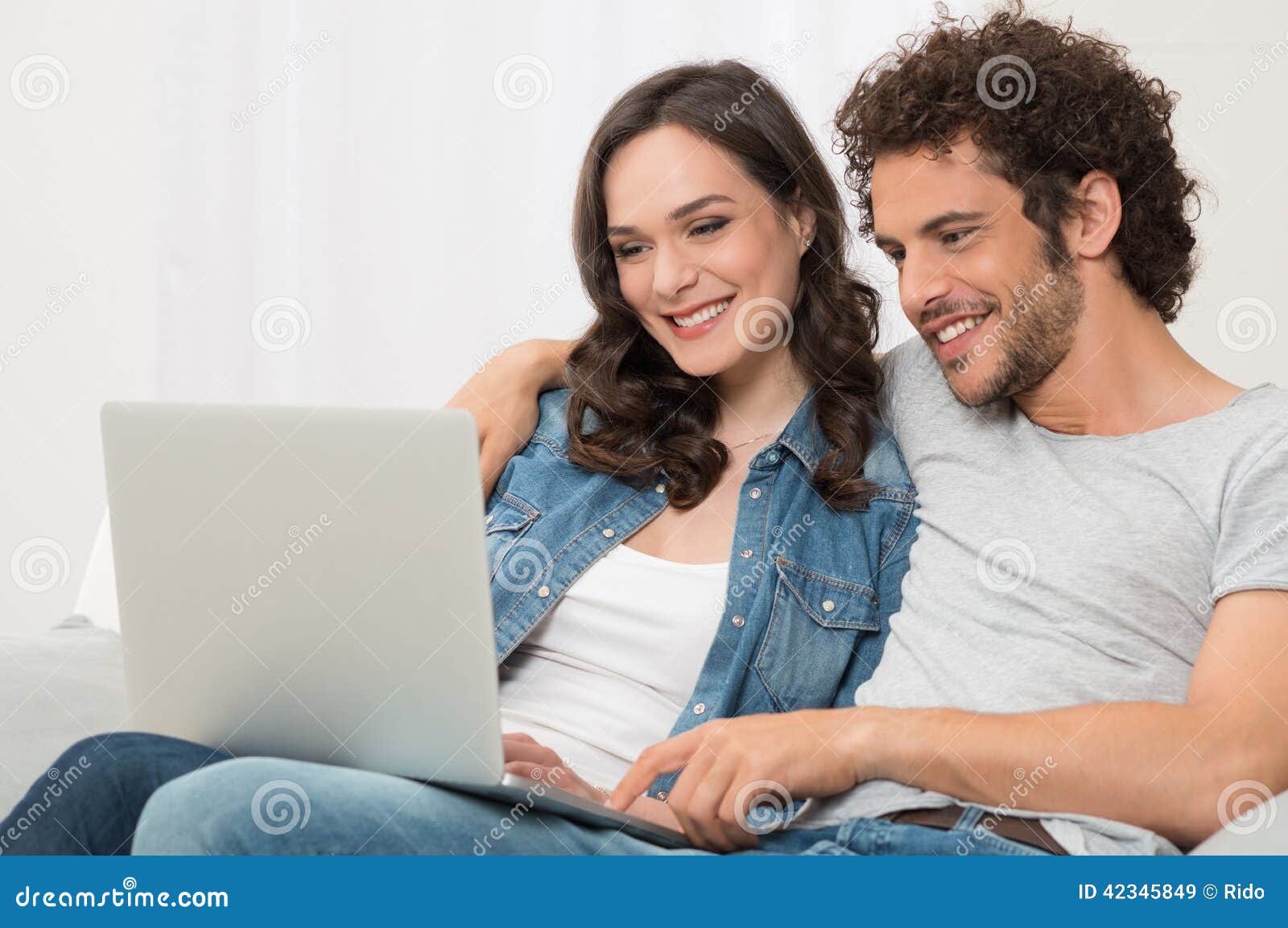 Happy Young Couple Using Laptop Stock Image - Image of boyfriend ...