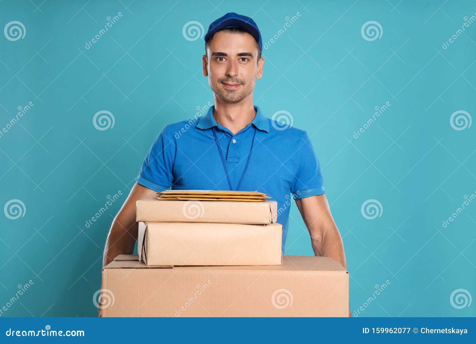Happy Young Courier with Parcels and Envelopes on Background Stock ...