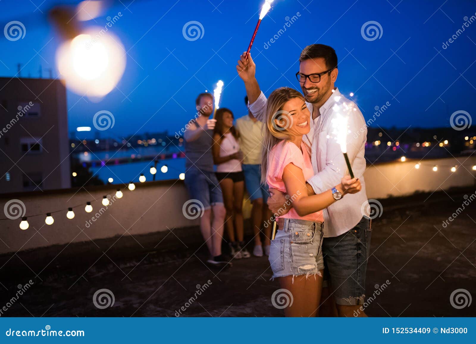Happy Young Dancing Couple Having Fun And Enjoying Party At Summer