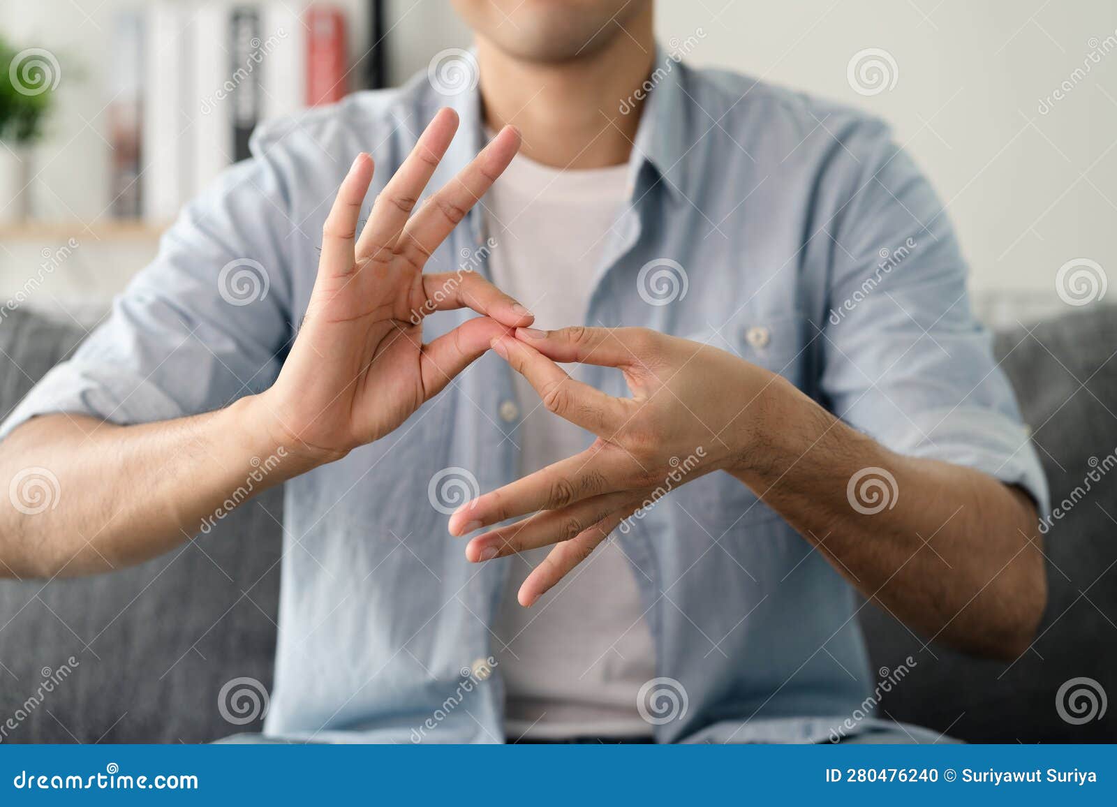Happy Young Deaf Man Using Sign Language To Communicate with Other ...