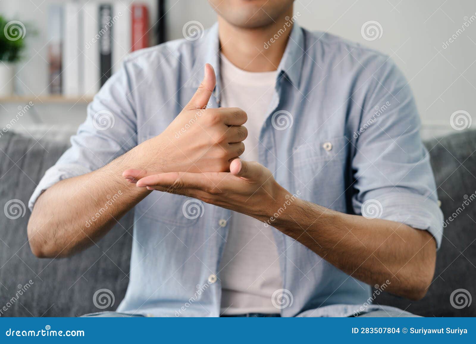 Happy Young Deaf Man Using Sign Language To Communicate with Other ...