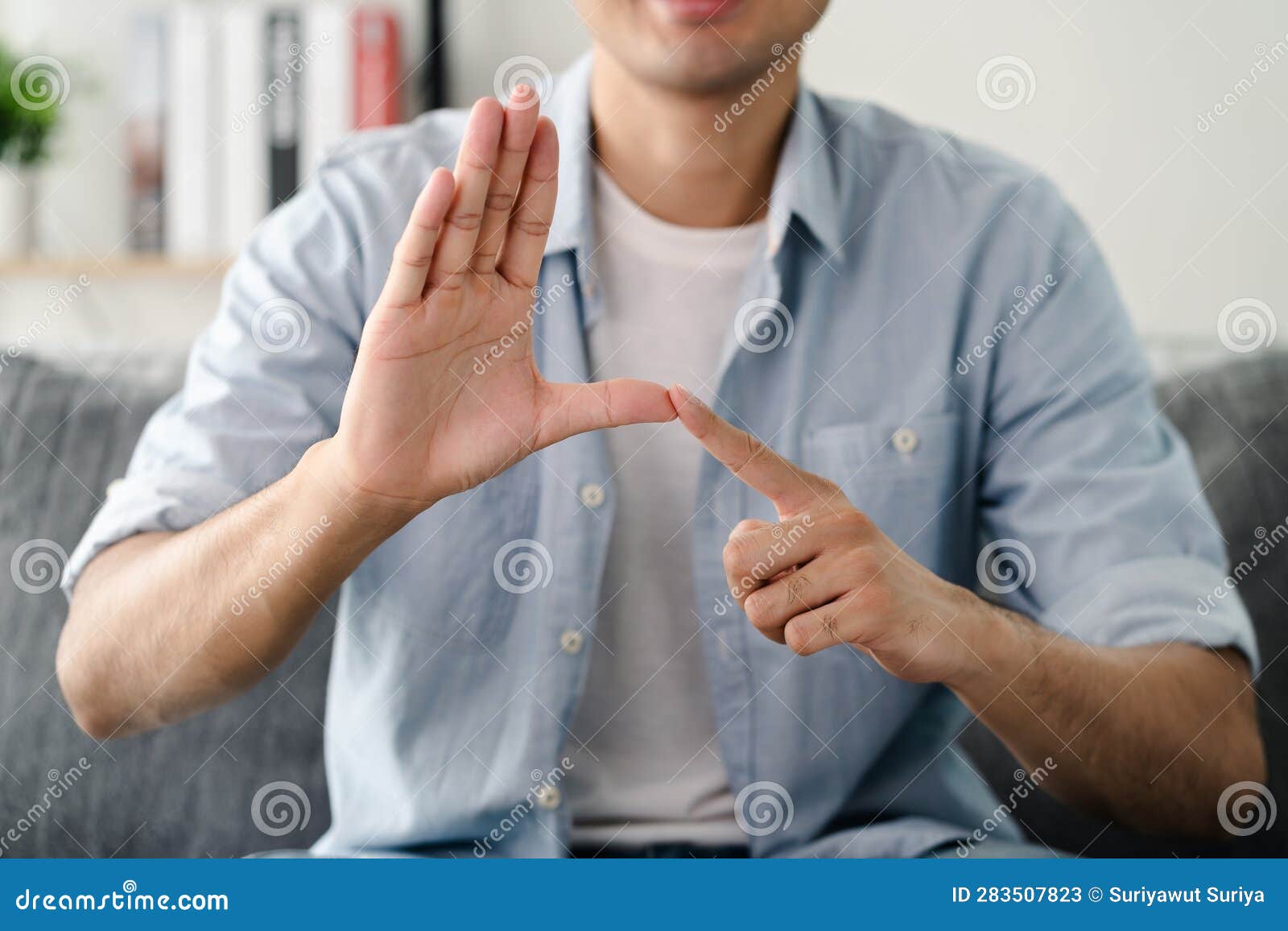 Happy Young Deaf Man Using Sign Language To Communicate with Other ...