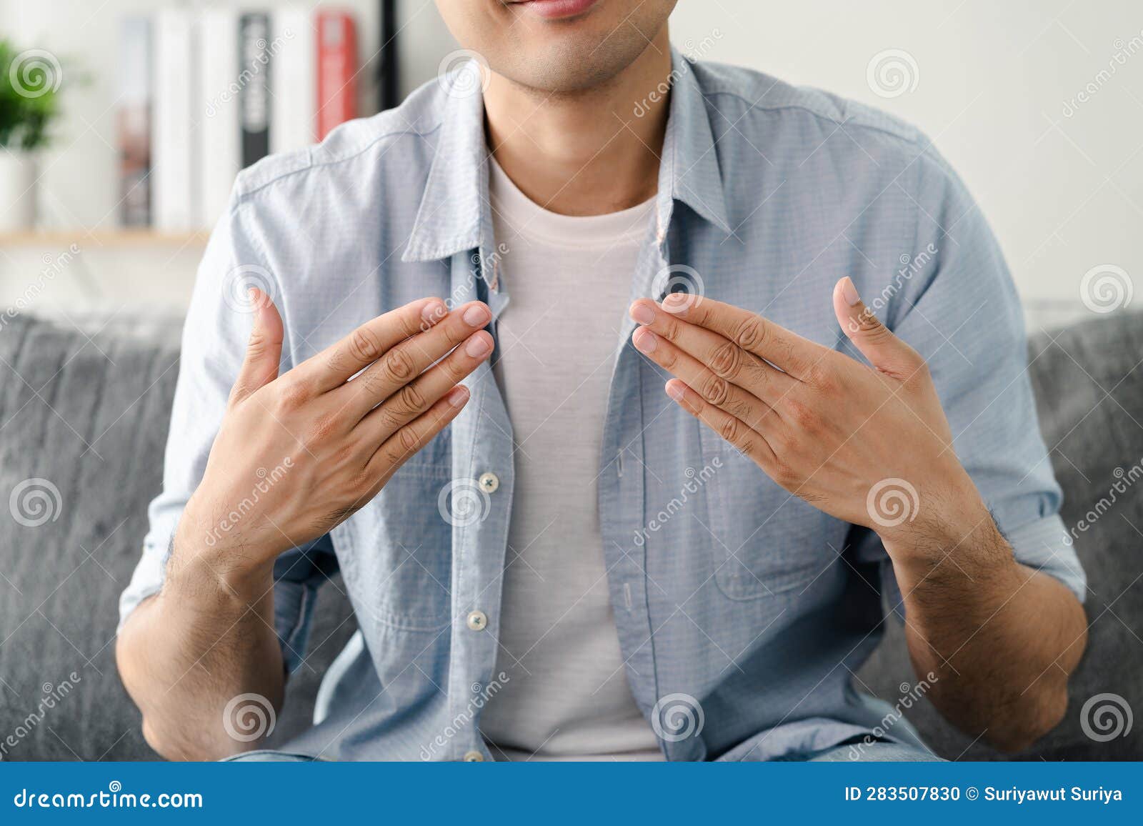 Happy Young Deaf Man Using Sign Language To Communicate with Other ...