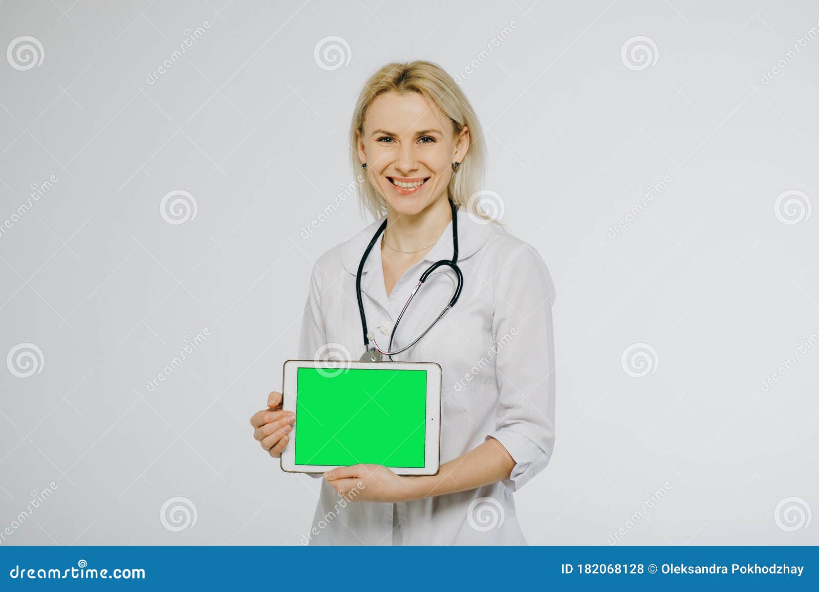 Happy Young Doctor Using Laptop Over White Background. Stock Photo ...