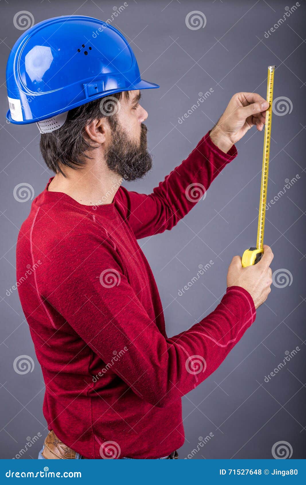 Happy Young Engineer with Hardhat Holding a Measuring Tape Stock Photo ...