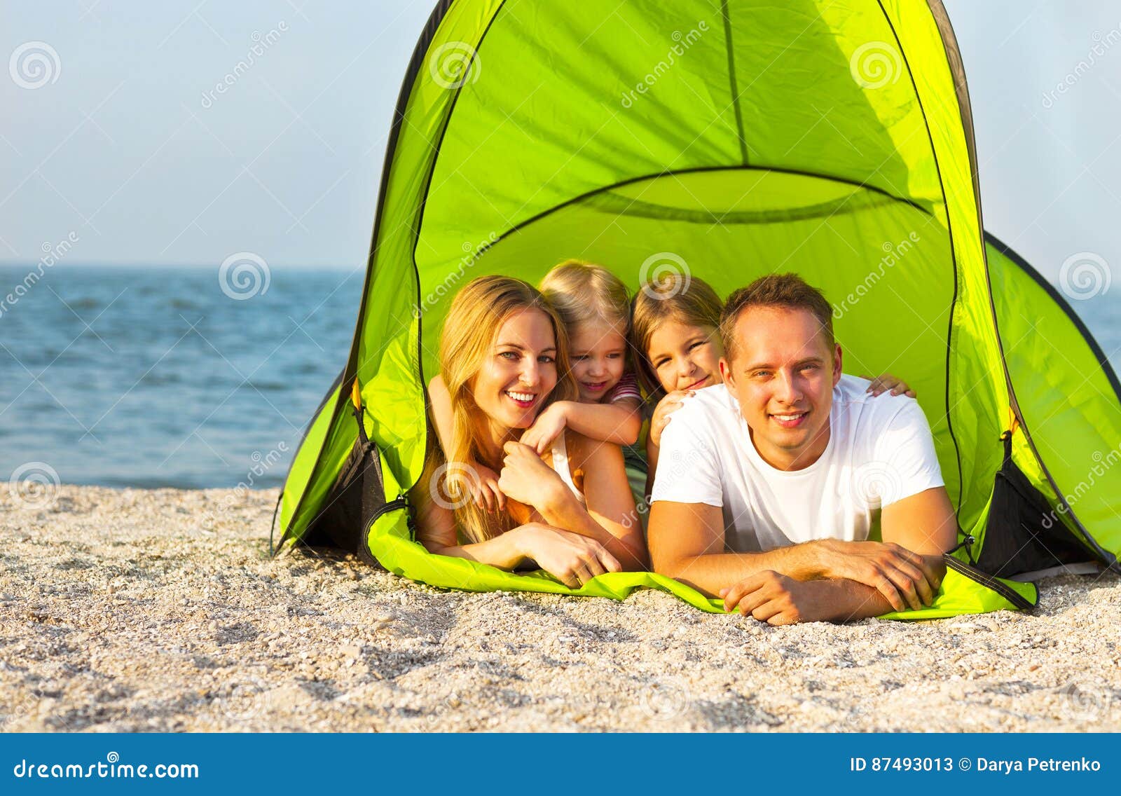Happy Young Family Camping on the Beach Stock Image - Image of ...