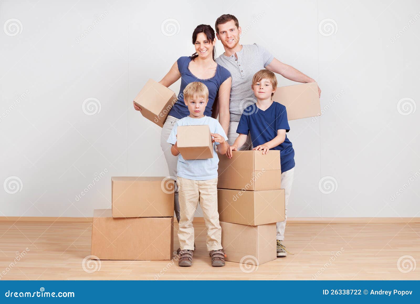 Happy Young Family Carrying Boxes Stock Photo - Image of happy, people ...