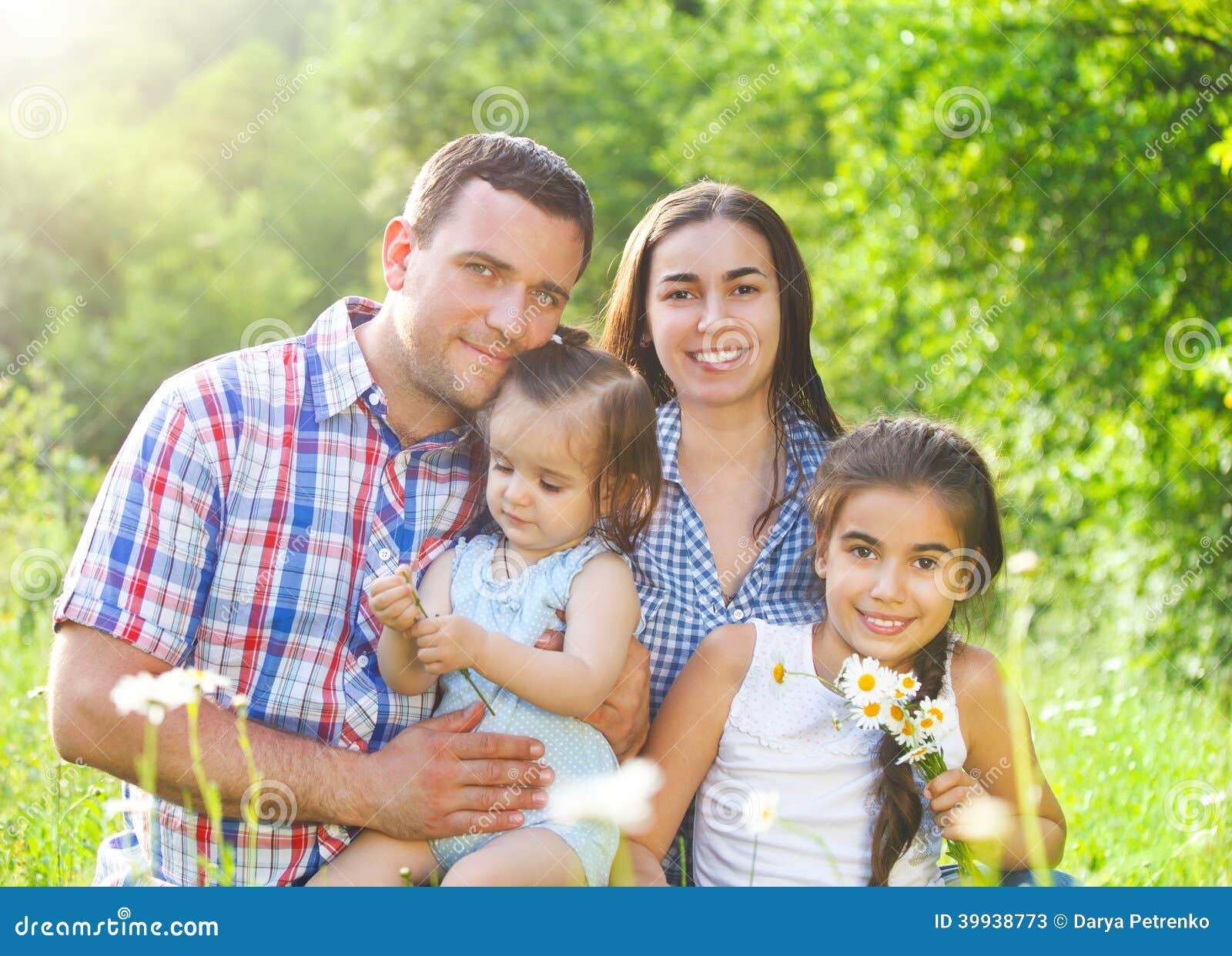 Happy Young Family with Children in the Spring Forest Stock Image ...