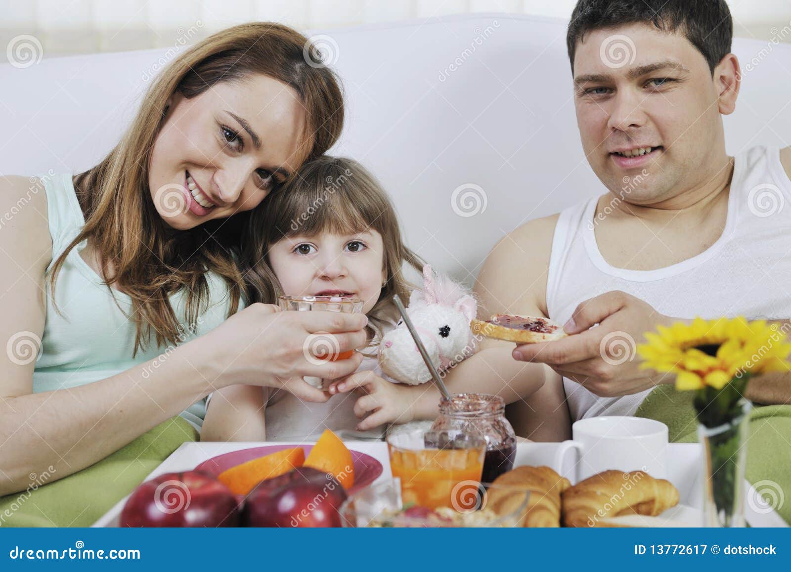 Happy Young Family Eat Breakfast in Bed Stock Image - Image of father ...