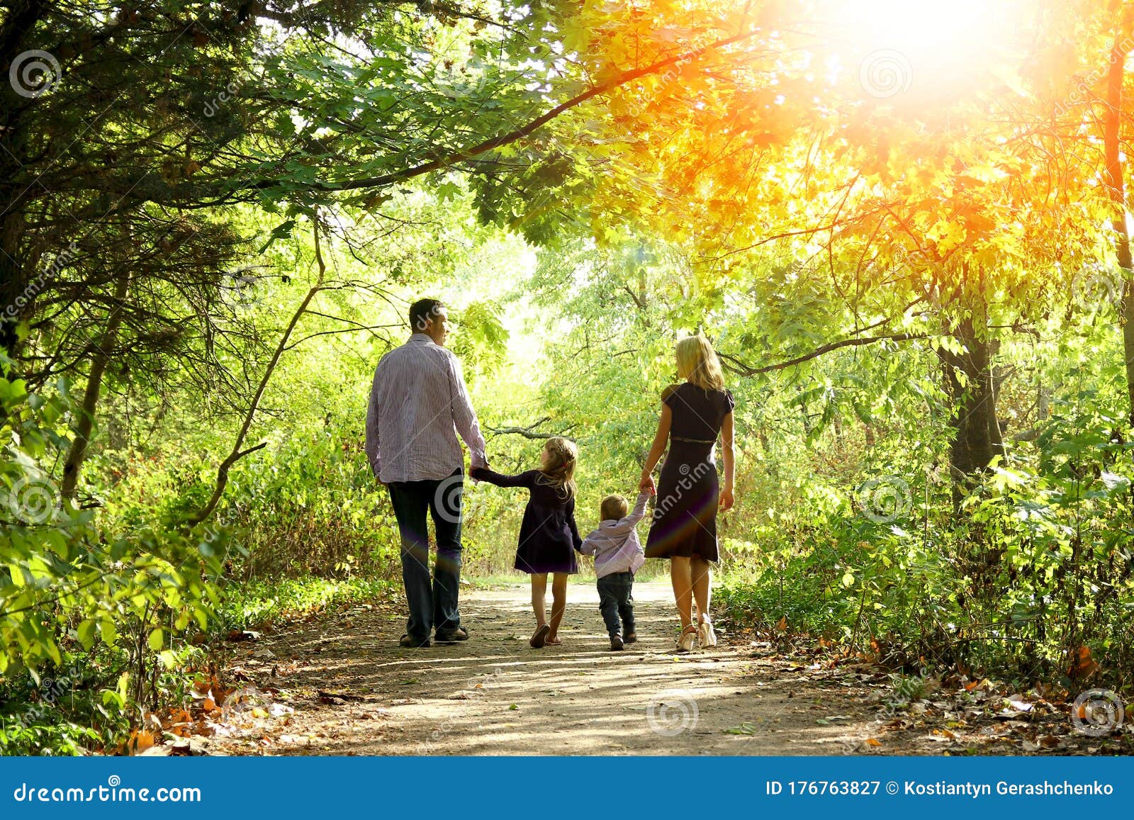 Happy Young Family in Nature Stock Image - Image of baby, beautiful ...