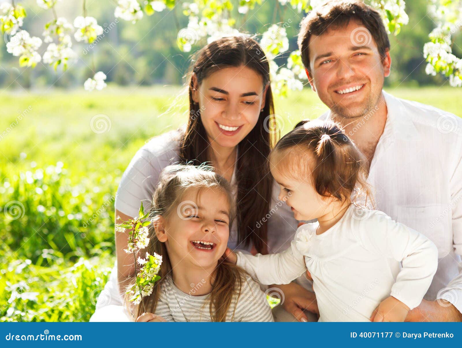 Happy Young Family with Two Children Outdoors Stock Image - Image of ...