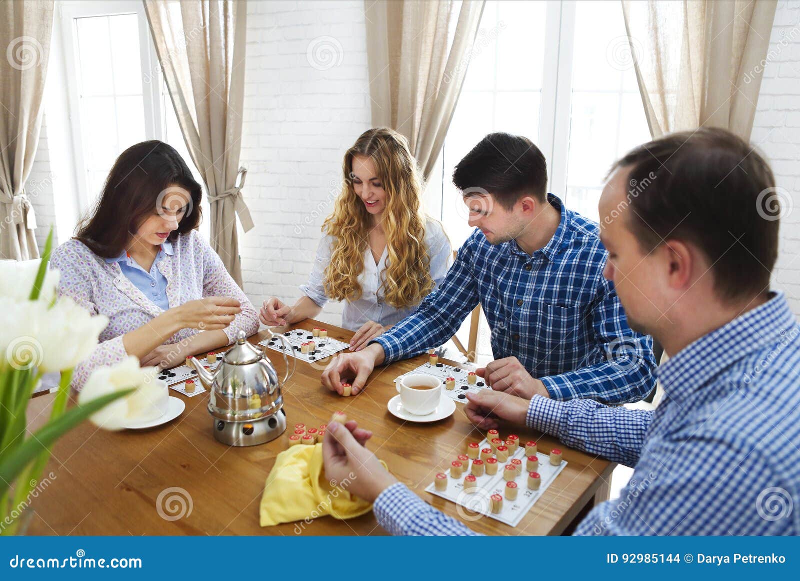 Happy Young Friends Playing Board Game Together Stock Photo - Image of ...