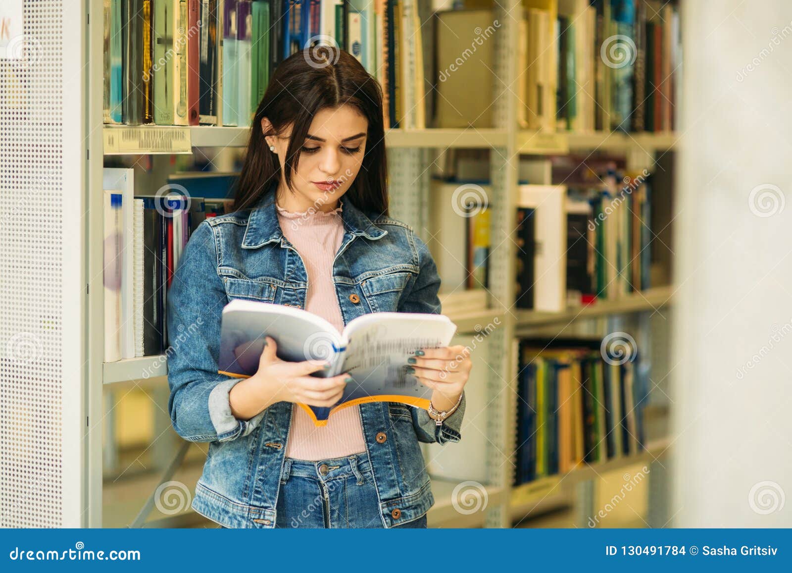 Happy Young Girl Student Studing in Library Stock Photo - Image of ...
