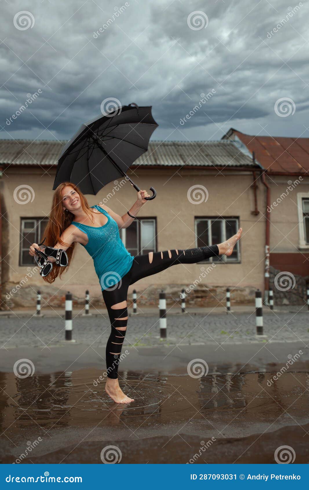 Happy Young Girl with Umbrella Dancing in a Puddle Stock Image - Image ...