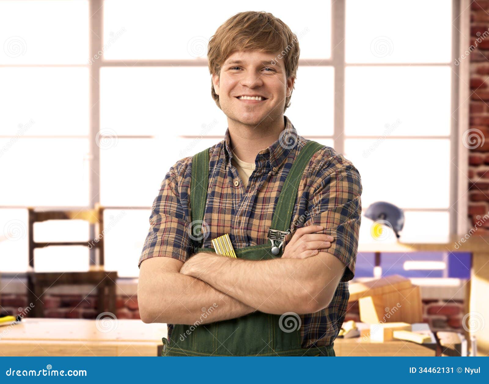 Happy Young Handyman in Workshop Stock Image - Image of happy ...