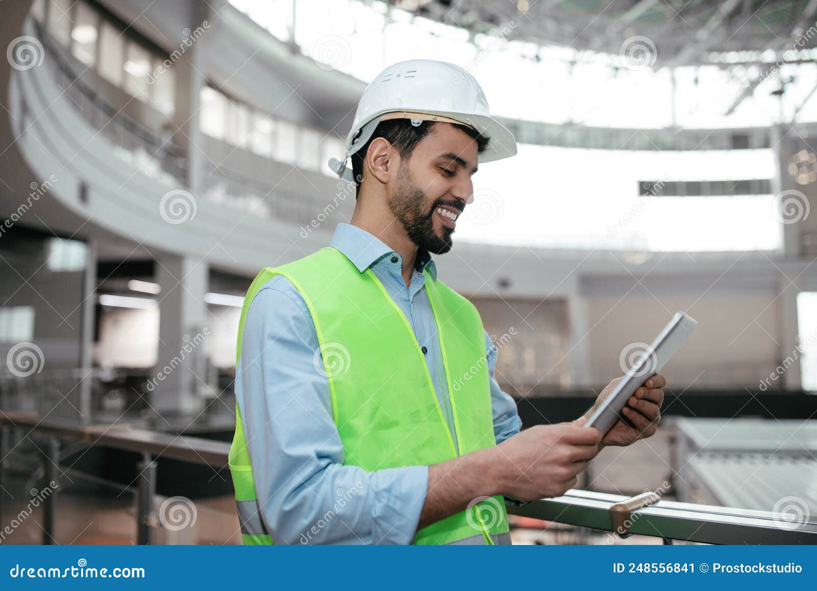 Happy Young Islamic Builder Engineer with Beard in Protective Clothing ...