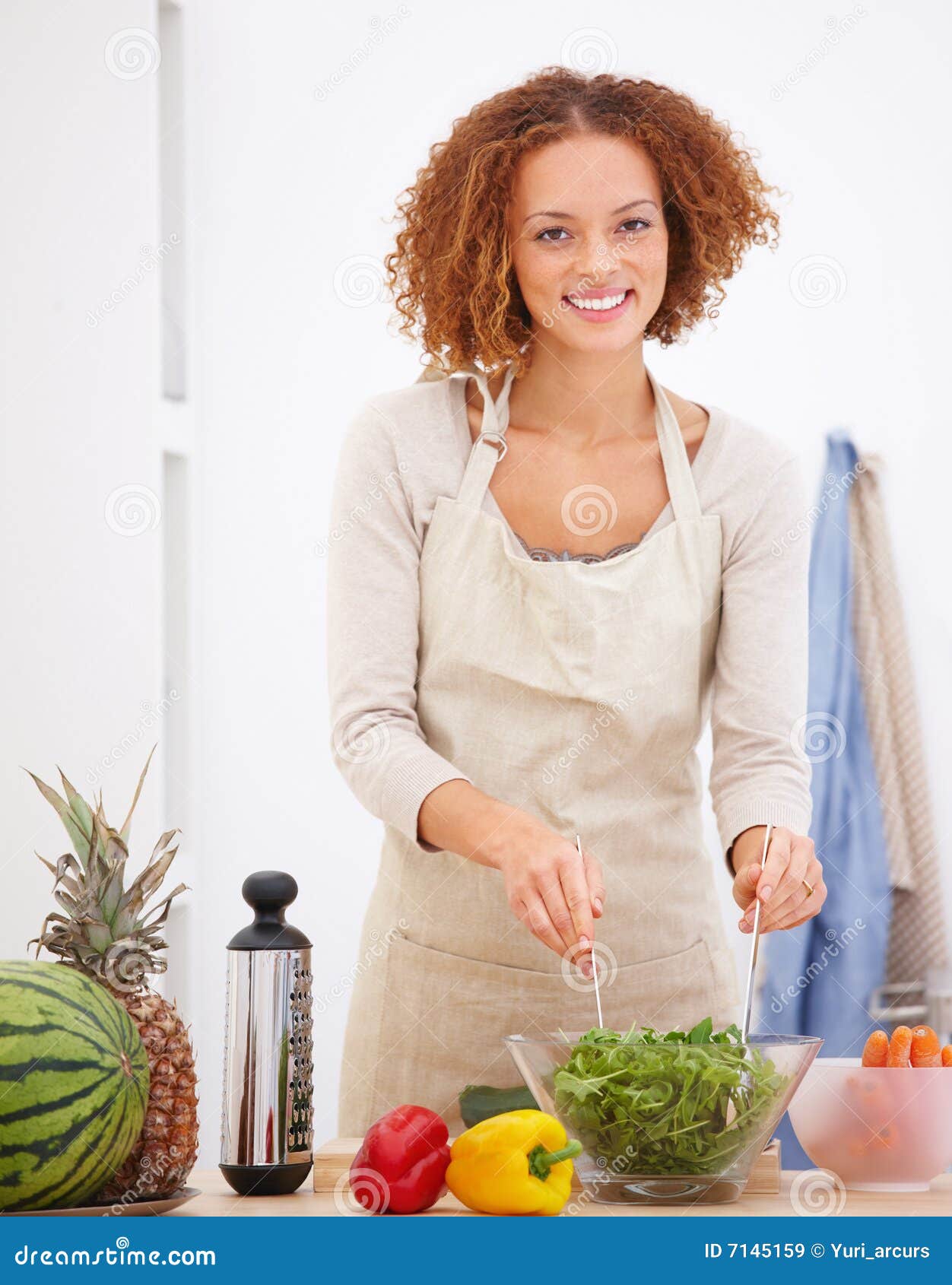 Happy Young Lady Preparing Food in a Kitchen Stock Image - Image of ...