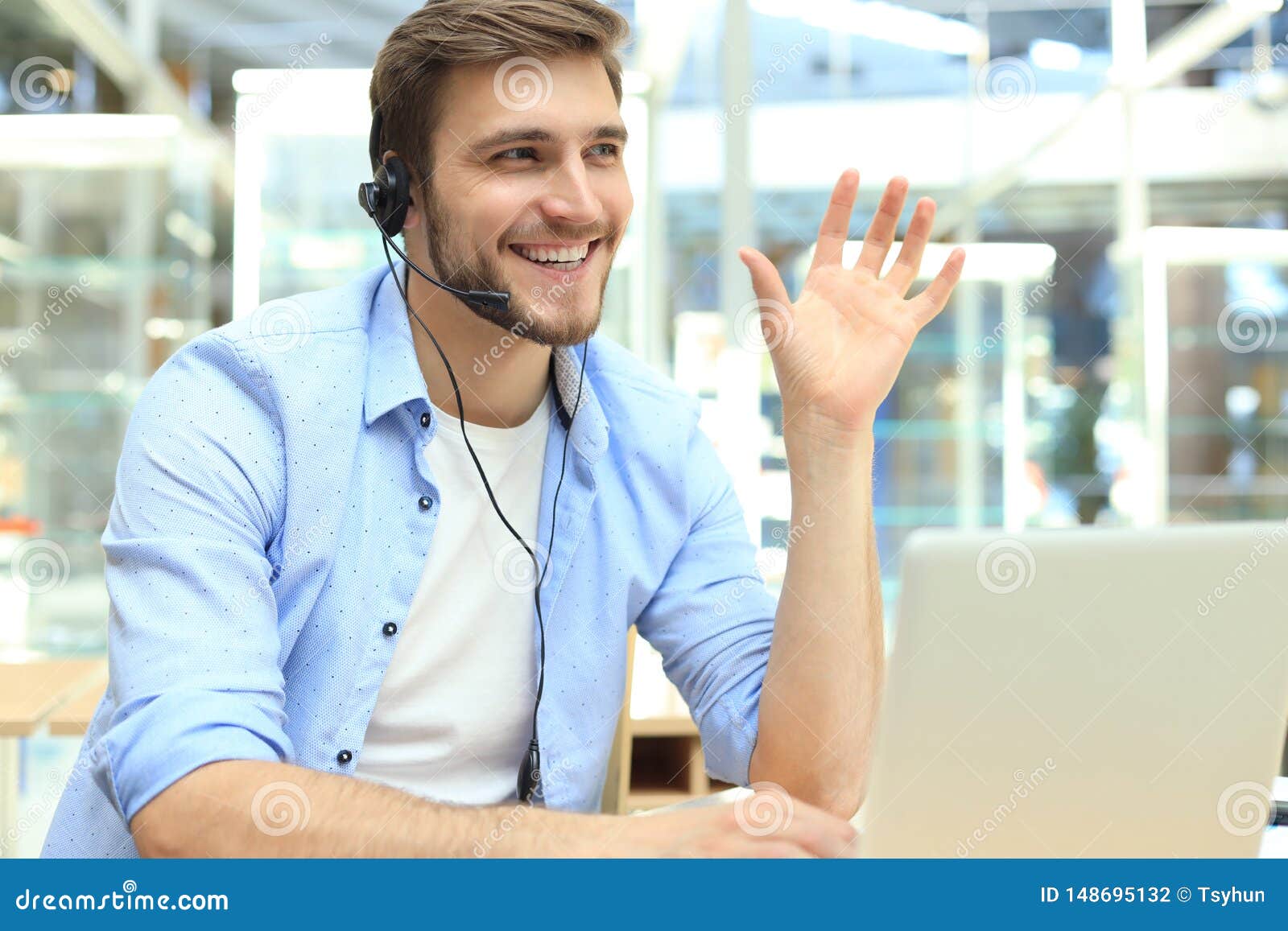 Happy Young Male Customer Support Executive Working in Office Stock ... Happy Young Male Customer Support Executive Working in Office Stock ...