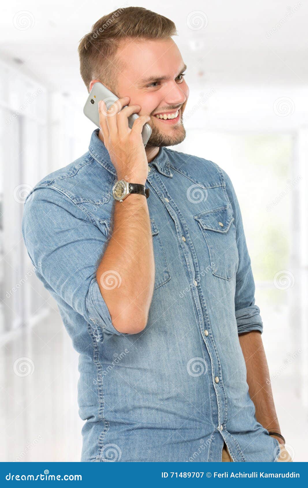 Happy Young Man Answering a Phone Stock Image - Image of casual ...