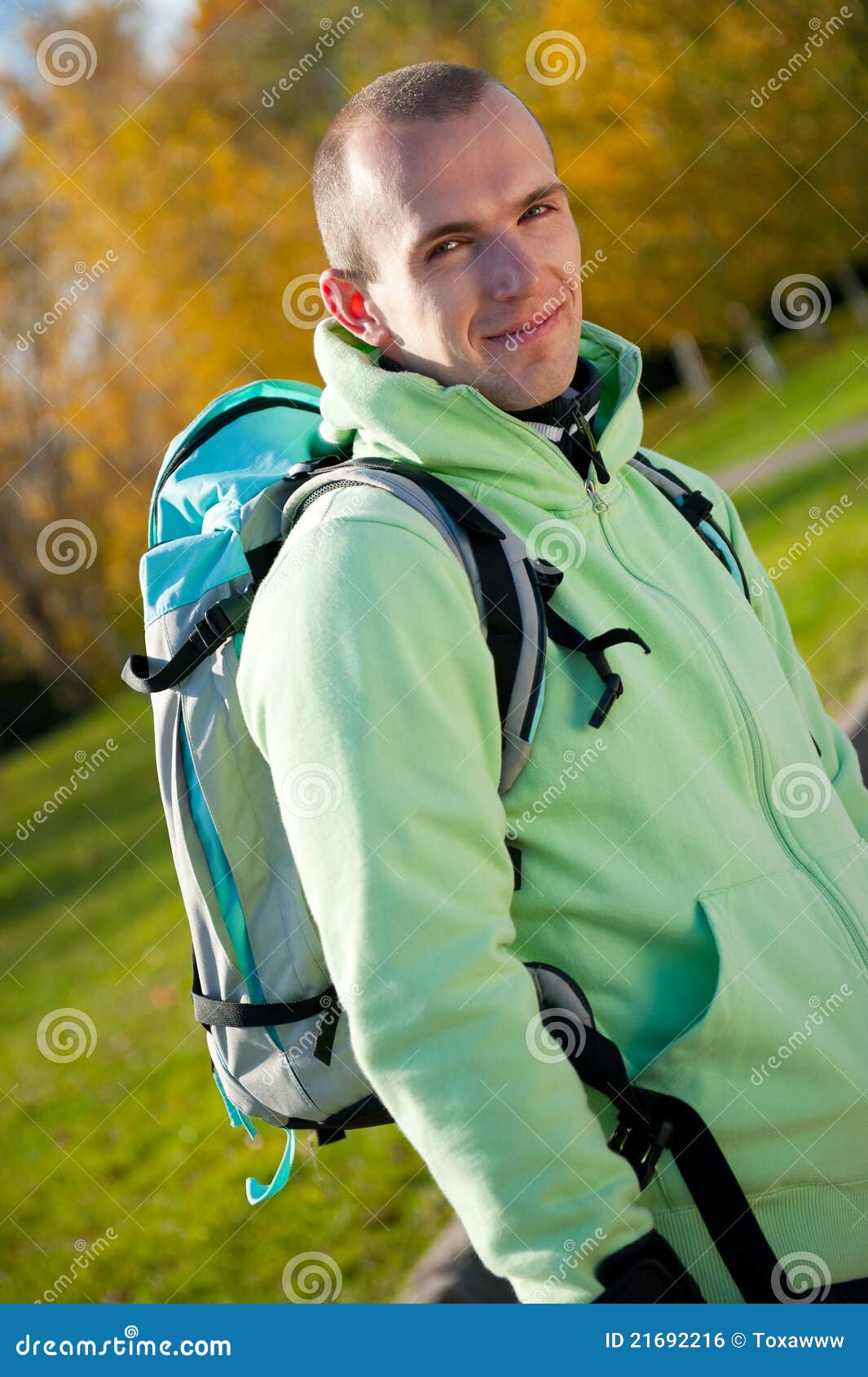 Happy Young Man with Backpack in the Park. Stock Photo - Image of ...
