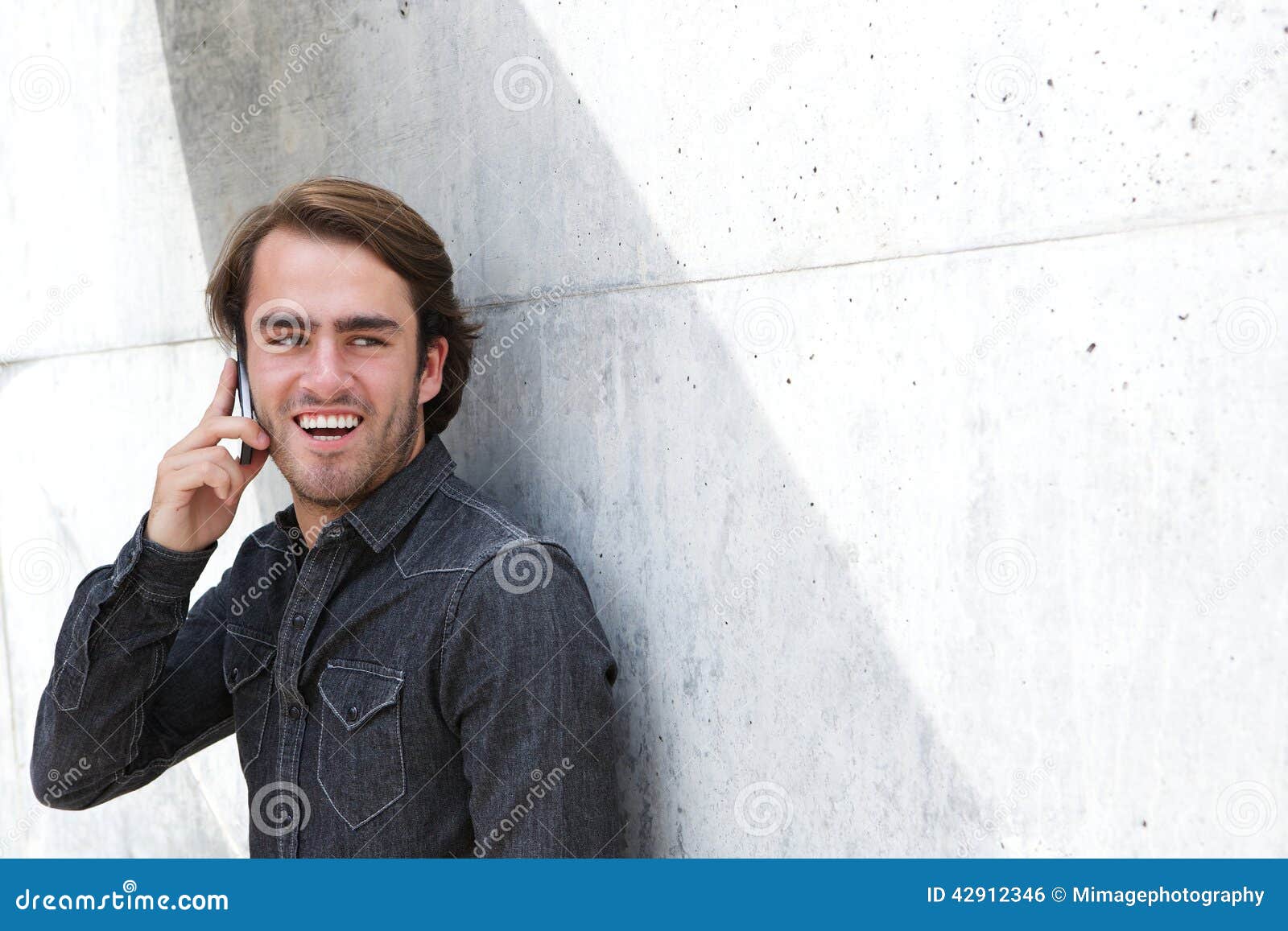 Happy Young Man Calling with Cellphone Stock Photo - Image of listen ...