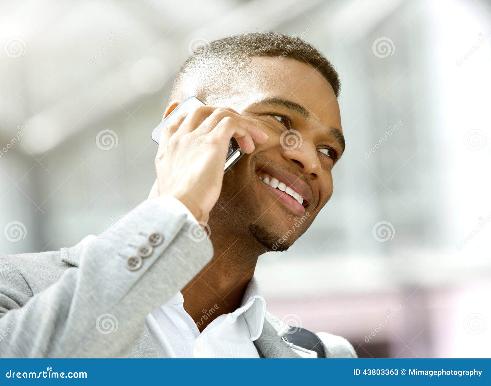 Happy Young Man Calling by Mobile Phone Stock Image - Image of handsome ...