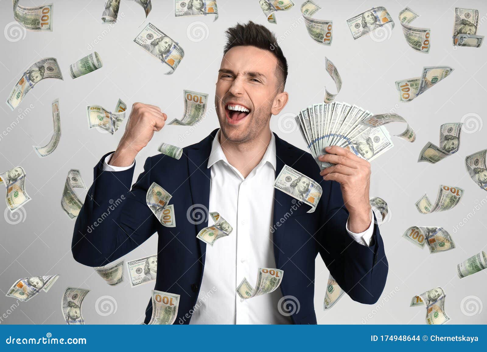 Happy Young Man with Dollars Under Money Rain on Background Stock Photo ...