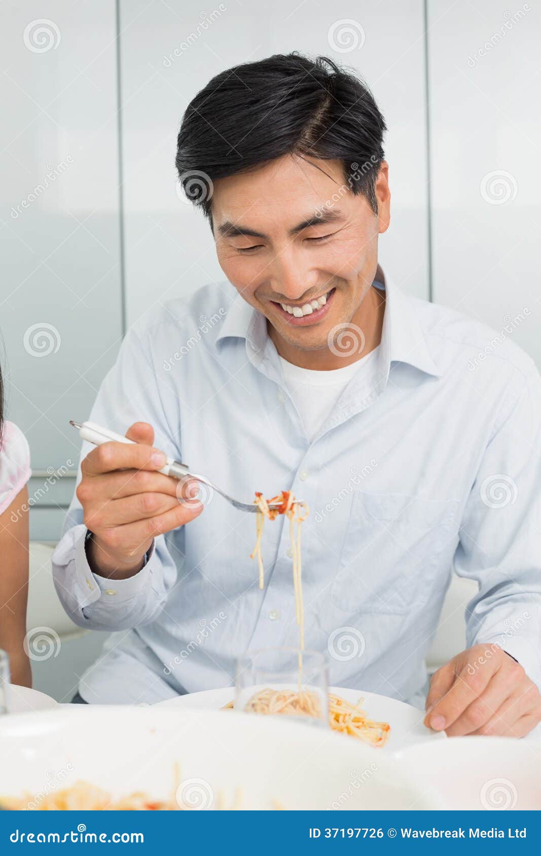 Happy Young Man Enjoying Spaghetti Lunch in Kitchen Stock Photo - Image ...