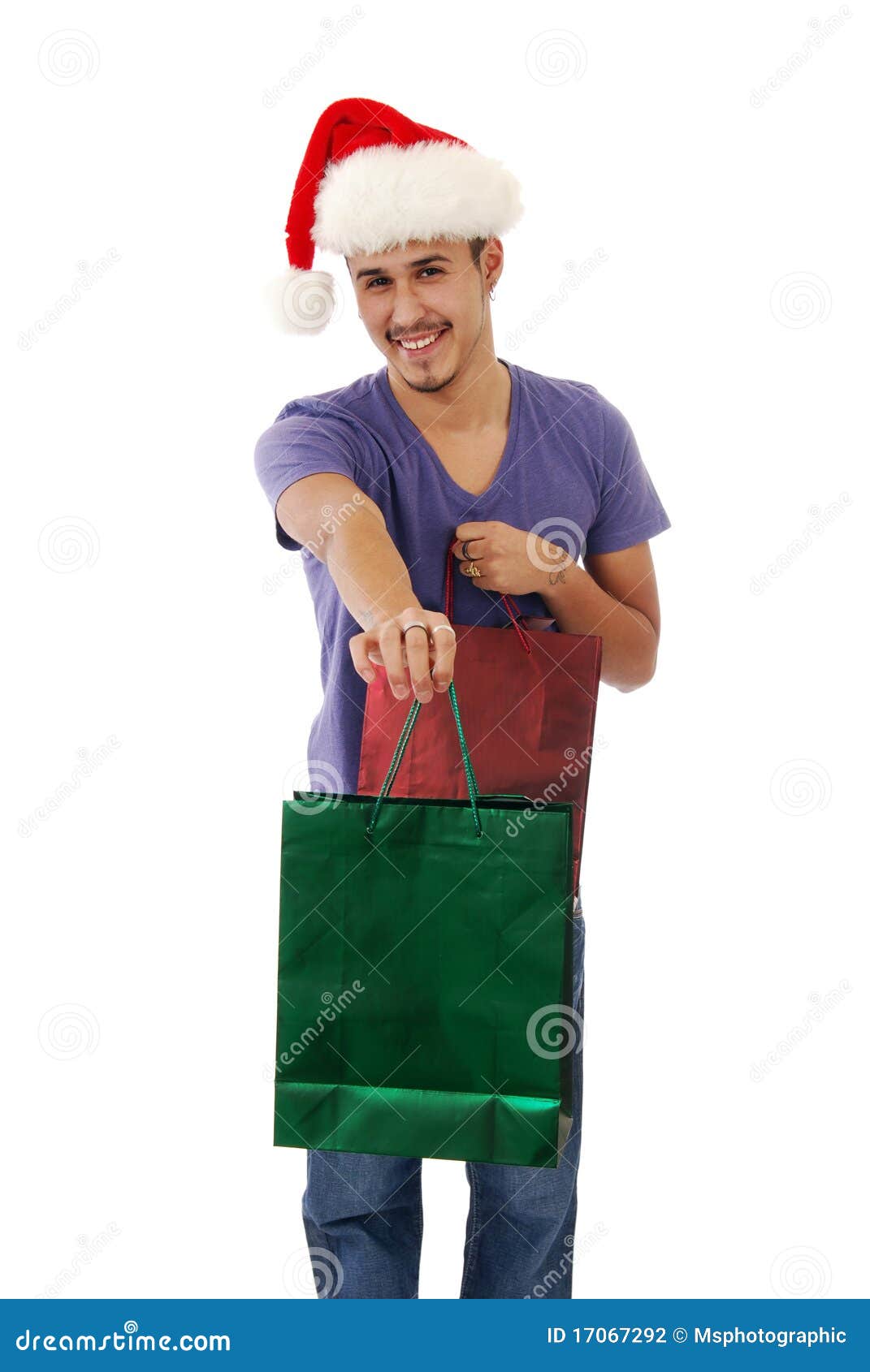 Happy Young Man Extending a Christmas Gift Stock Photo - Image of ...