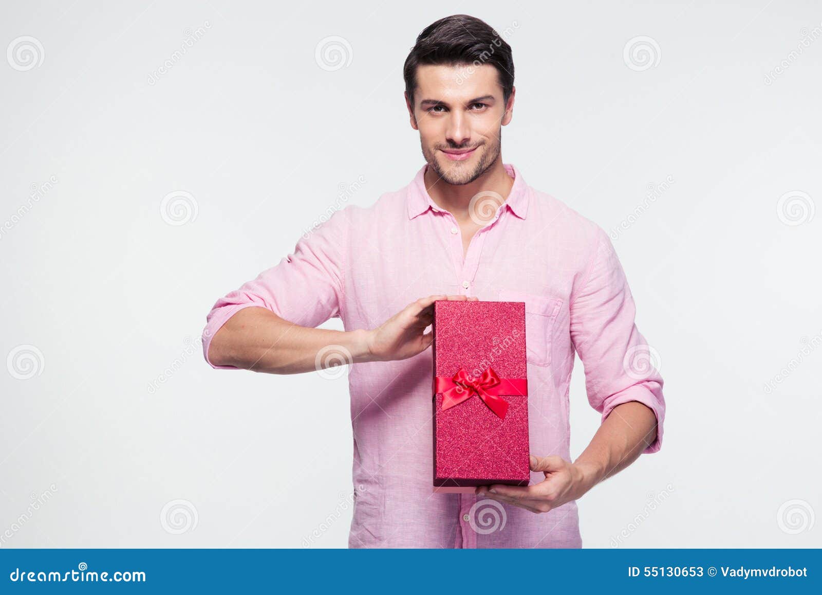 Happy Young Man Holding Gift Box Stock Image - Image of impressive ...
