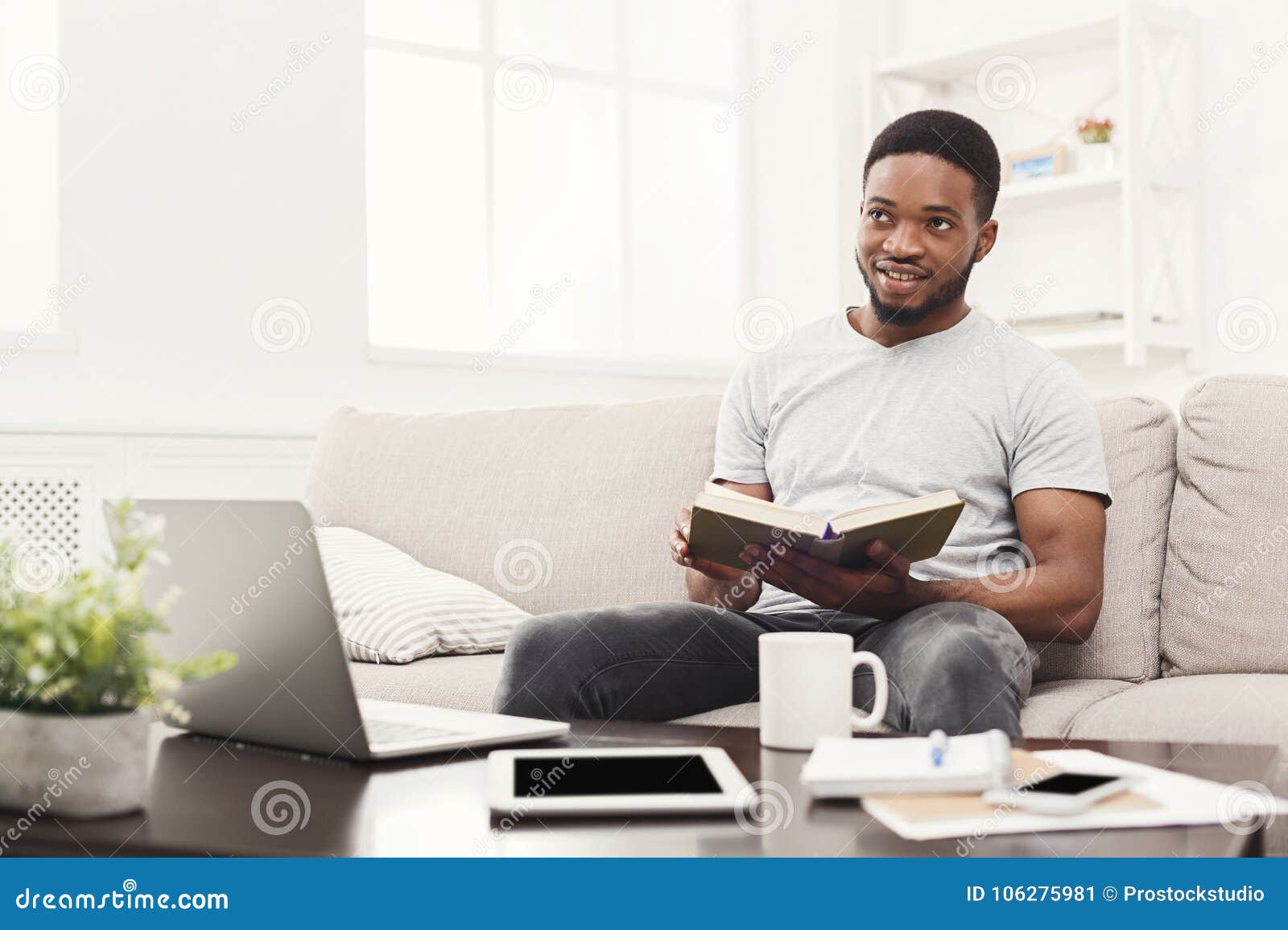 Happy Young Man at Home Reading Book Stock Image - Image of reading ... Happy Young Man at Home Reading Book Stock Image - Image of reading ...