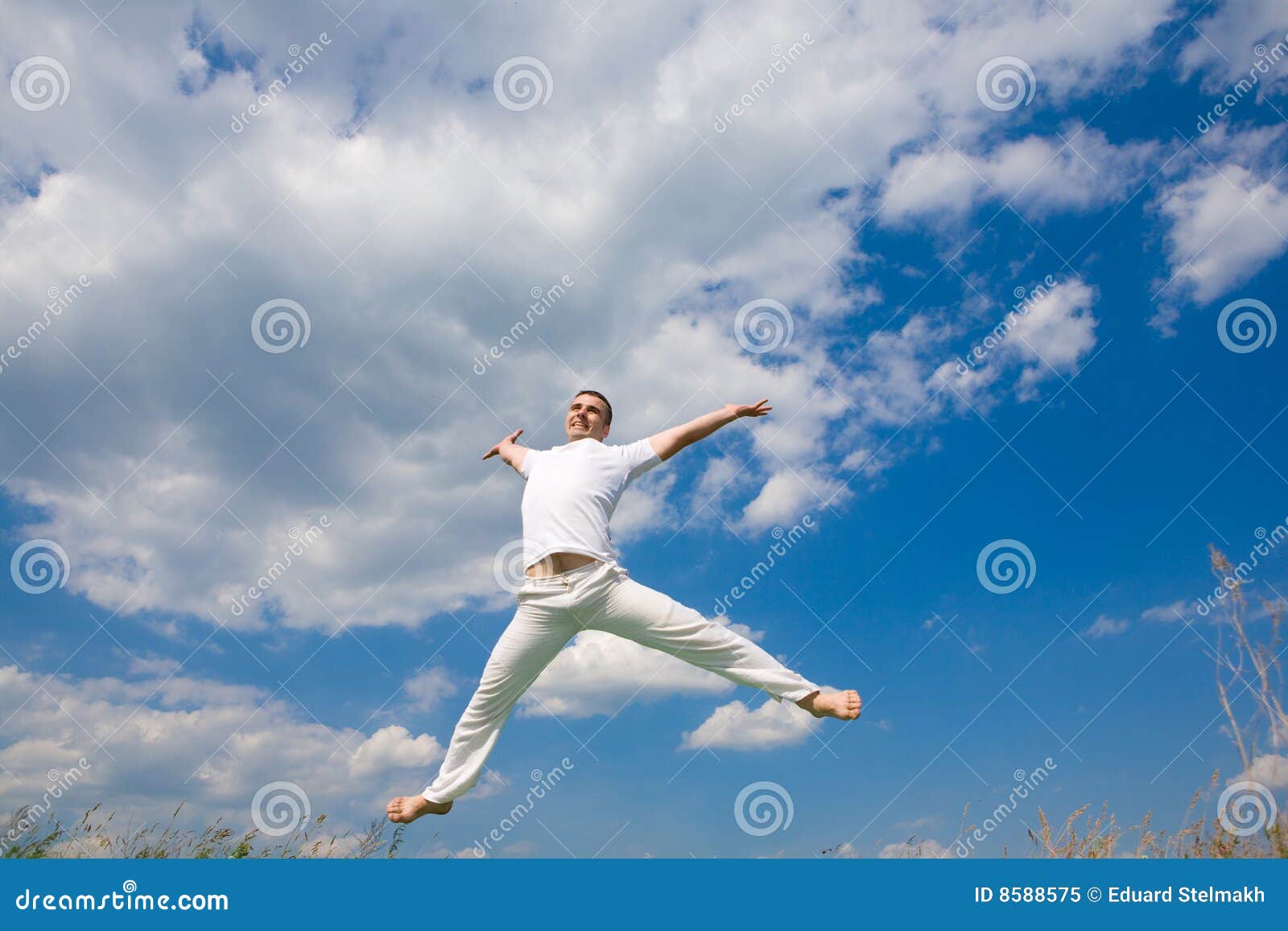 Happy young man - jumping stock image. Image of outdoor - 8588575