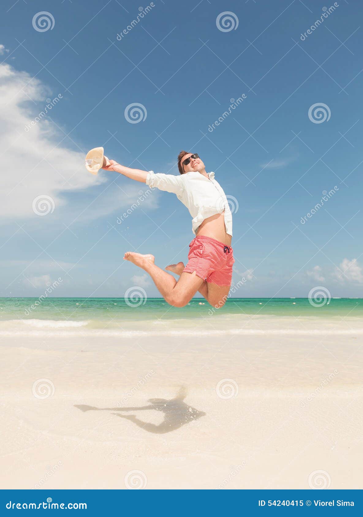 Happy Young Man Jumping on the Beach Stock Image - Image of caribbean ...