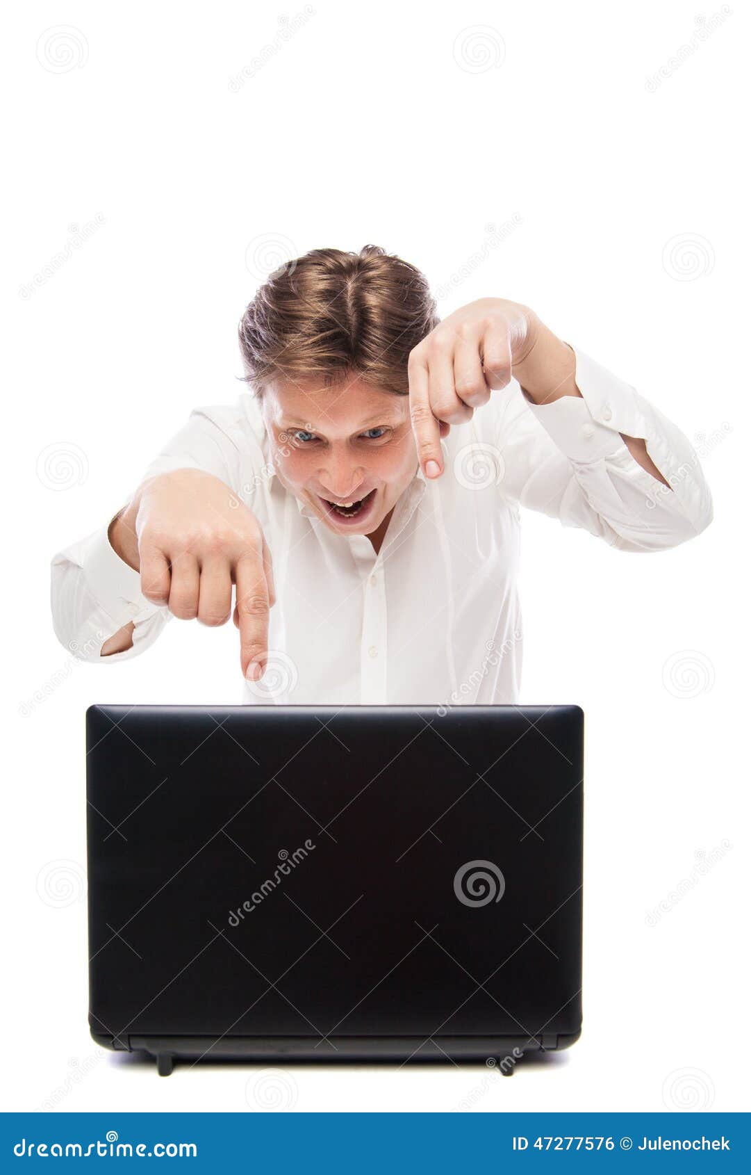 Happy Young Man Looking at Laptop and Gesturing Stock Photo - Image of ...