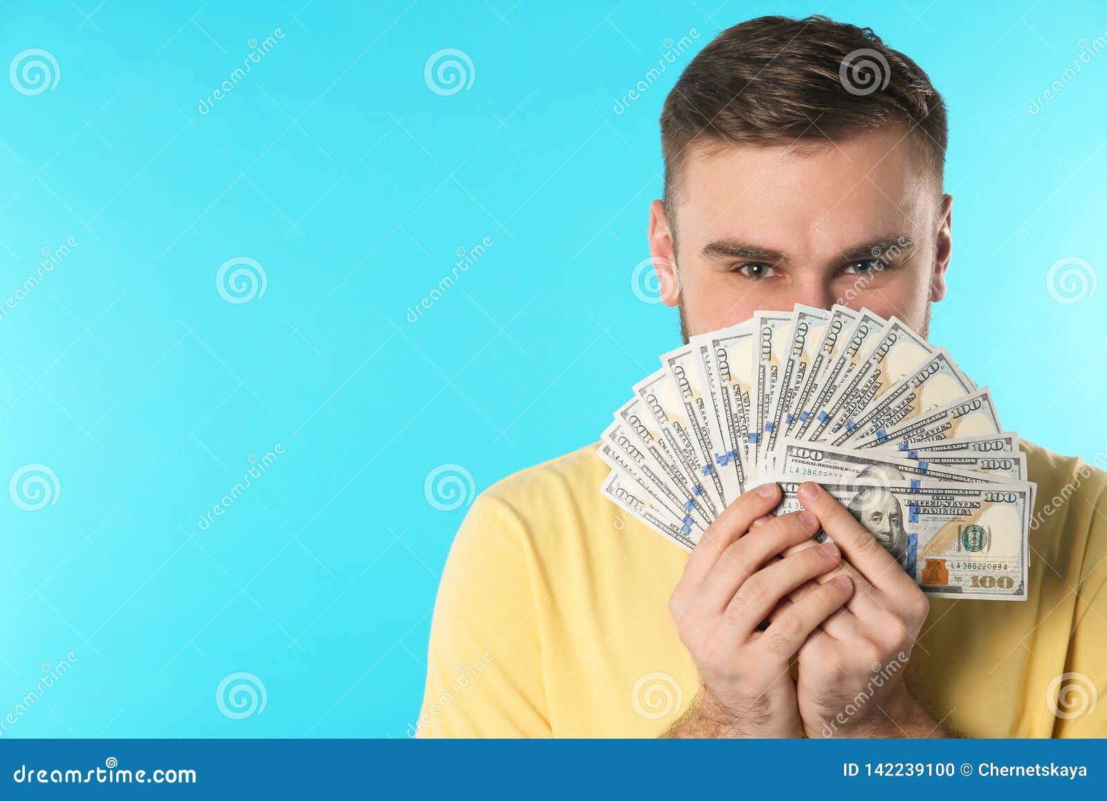 Happy Young Man with Money on Color Background Stock Photo - Image of ...