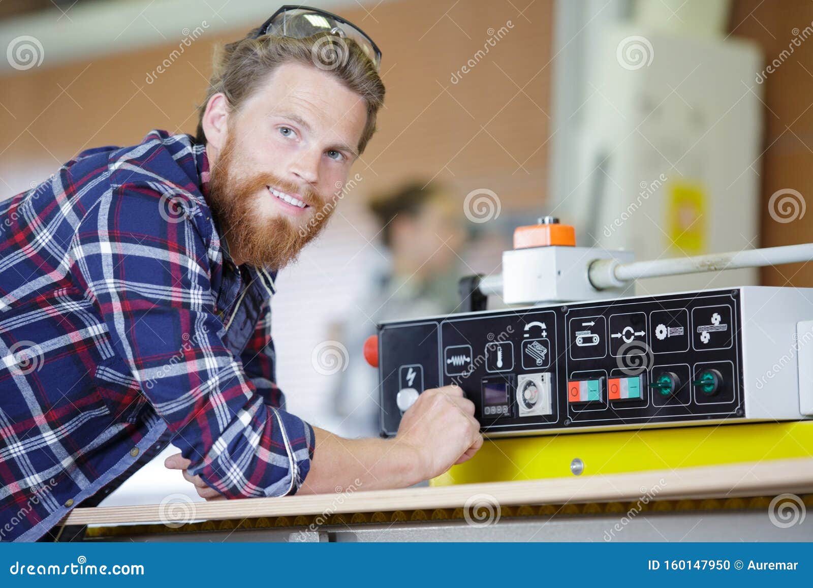 Happy Young Man Operating Machine Stock Photo - Image of carpentry ...