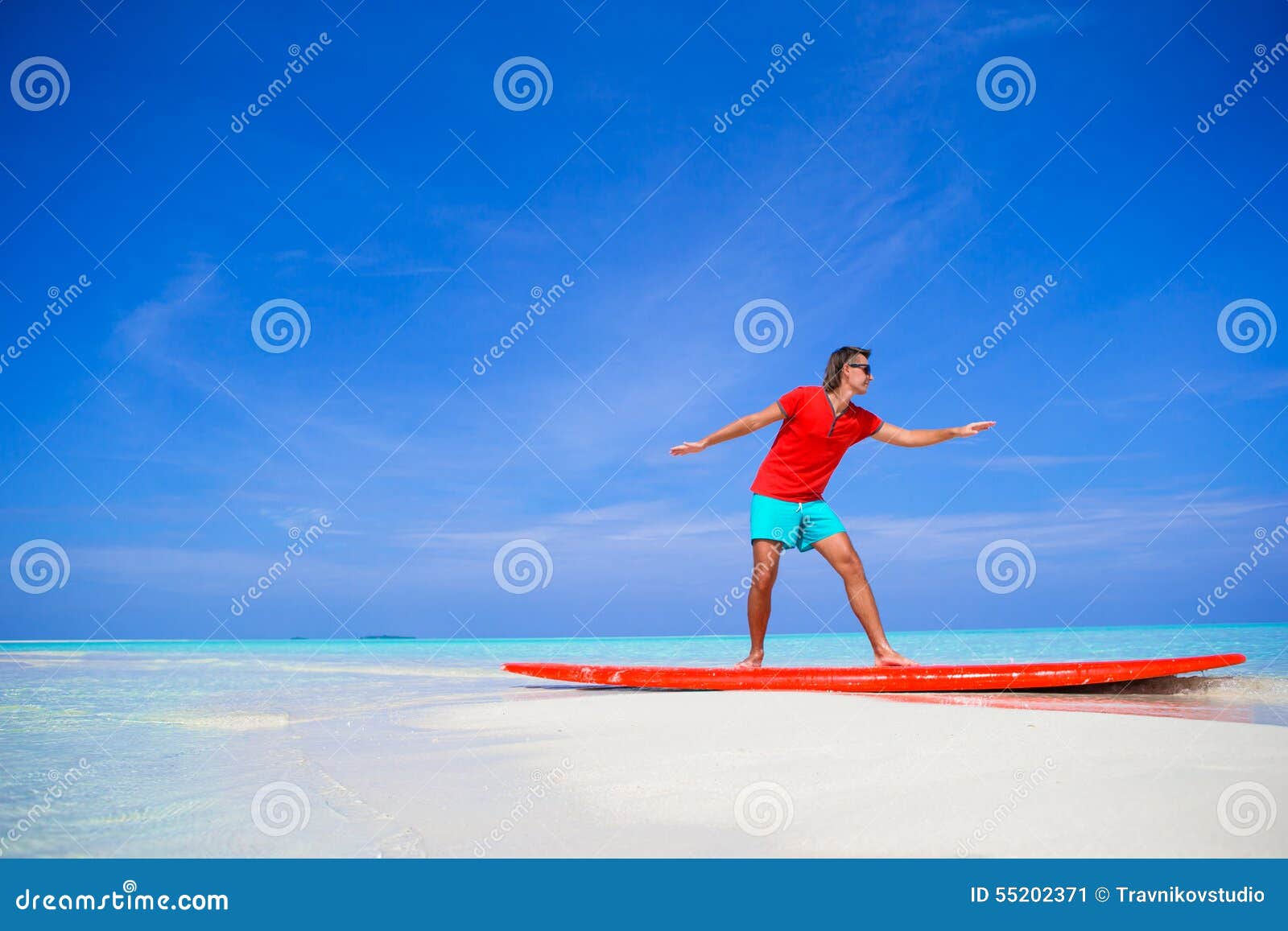 Happy Young Man Practicing Surfing Position on Stock Image - Image of ...