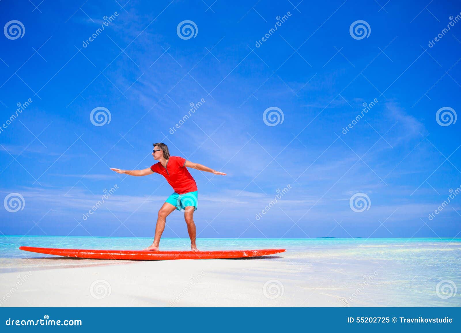 Happy Young Man Practicing Surfing Position on Stock Image - Image of ...