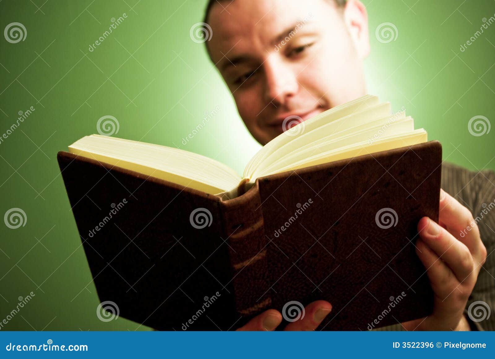 Happy Young Man Reading Book Stock Photo - Image of brunette, education ...