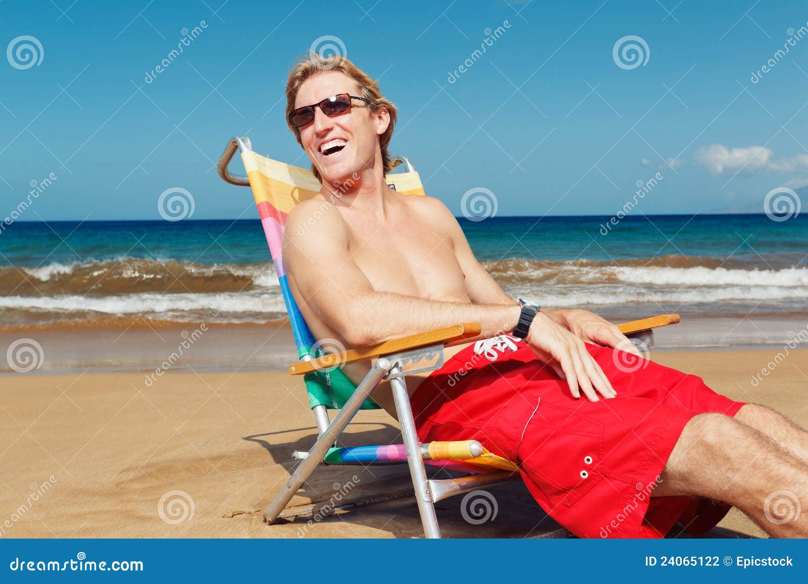 Happy Young Man Relaxing on the Beach Stock Photo - Image of male ...