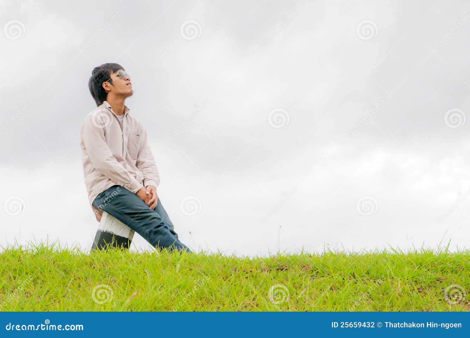 Happy Young Man Rest on the Grass Field Stock Photo - Image of hand ...