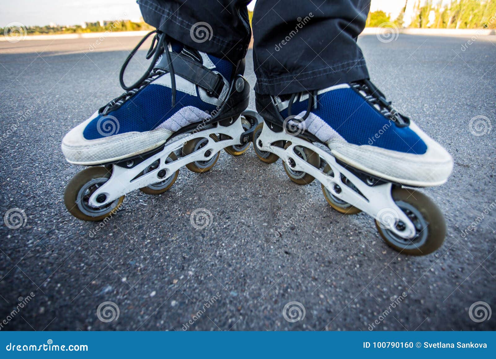Happy Young Man Rollerblading in City Park Stock Photo - Image of ...