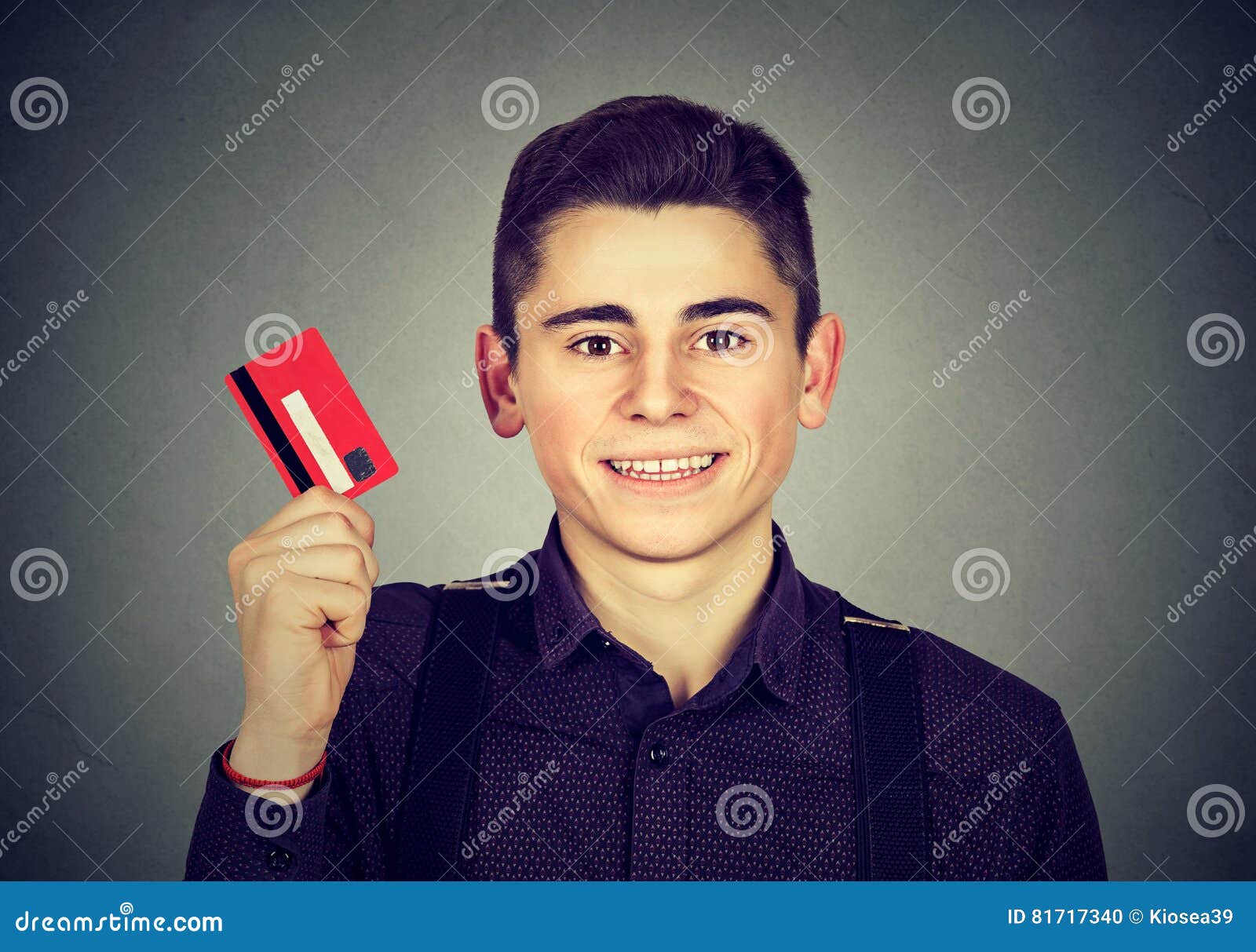 Happy Young Man Showing Credit Card Stock Photo - Image of loan ...
