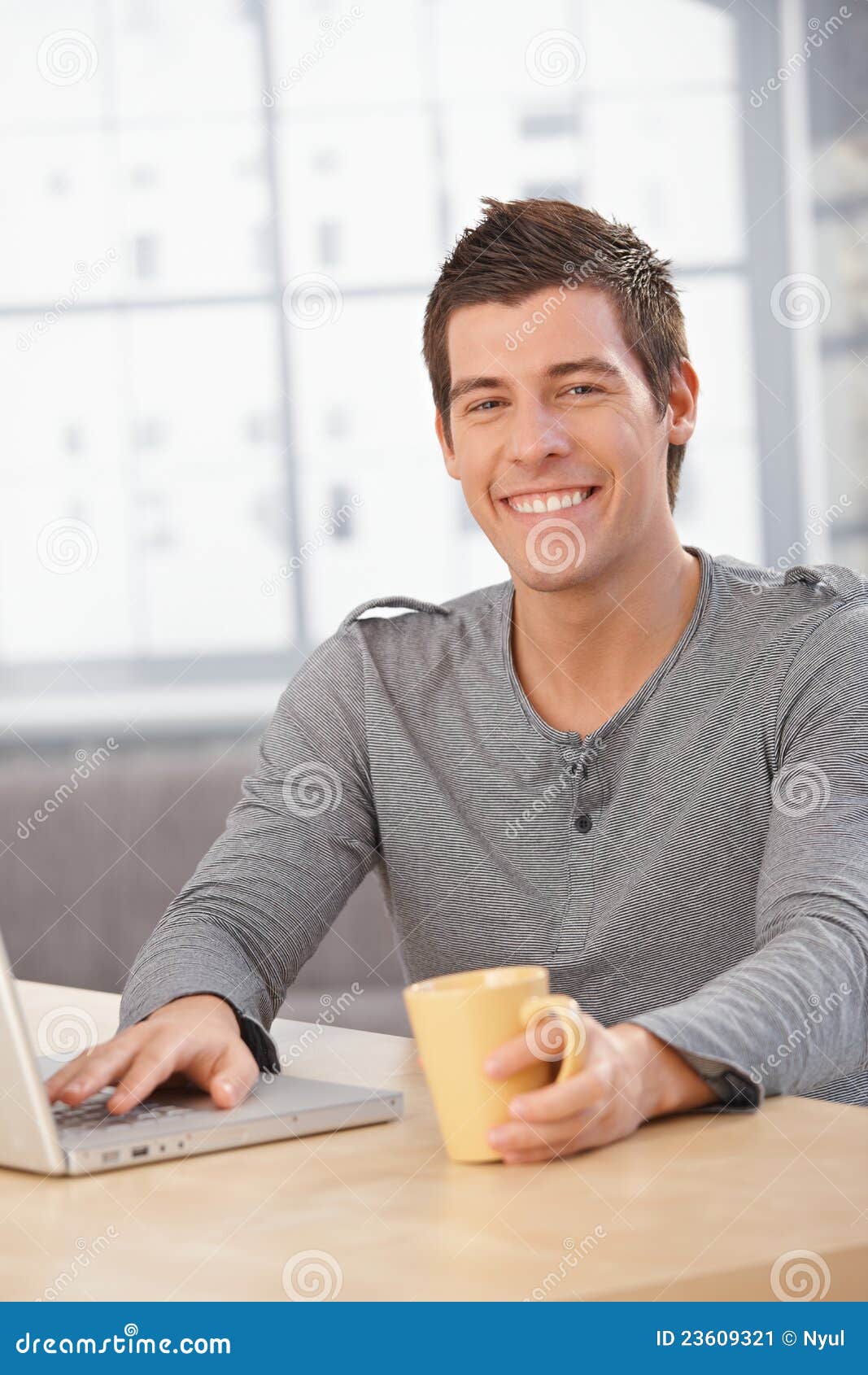 Happy Young Man Sitting at Table Stock Image - Image of happiness, face ...