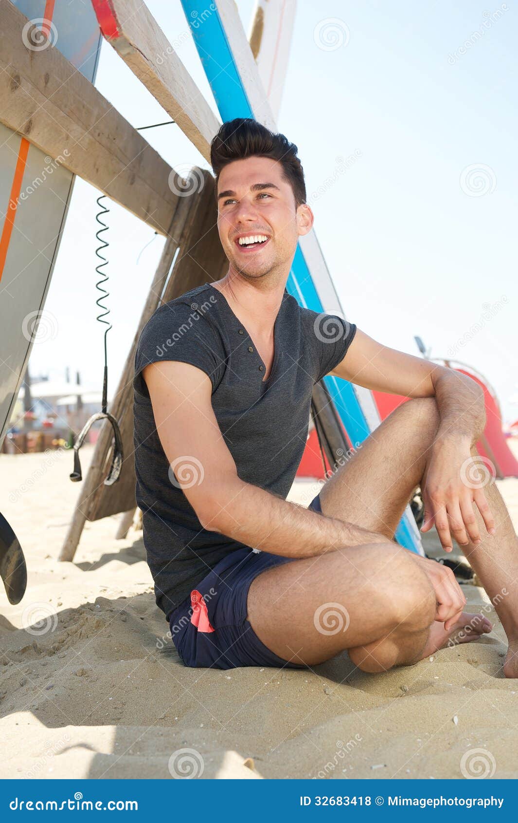 Happy Young Man Smiling at the Beach Stock Photo - Image of portrait ...