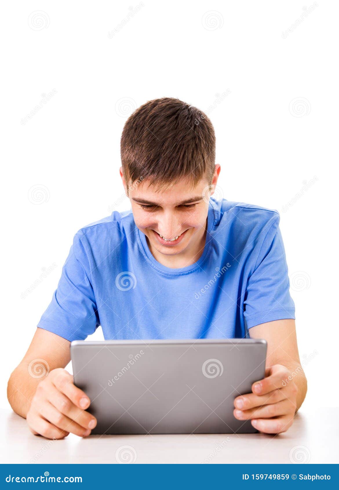 Young Man with a Tablet stock image. Image of casual - 159749859