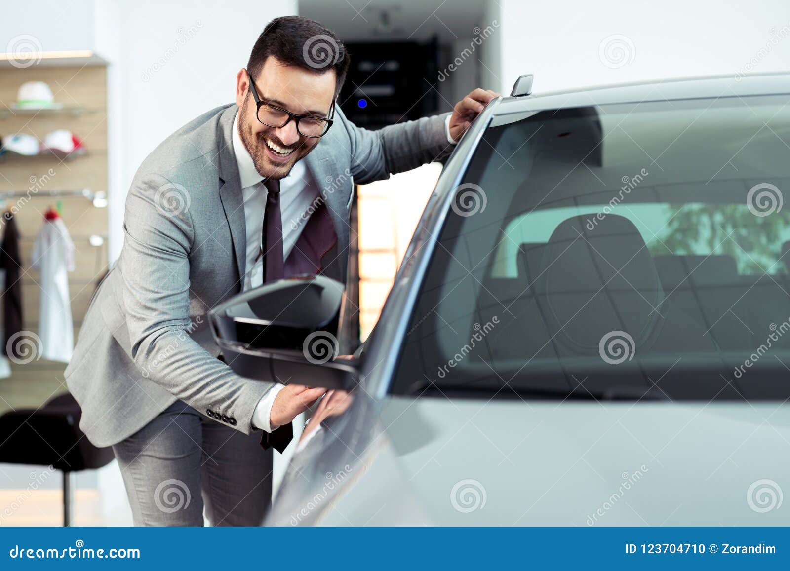 Happy Man Touching Car in Auto Show or Salon Stock Photo - Image of ...